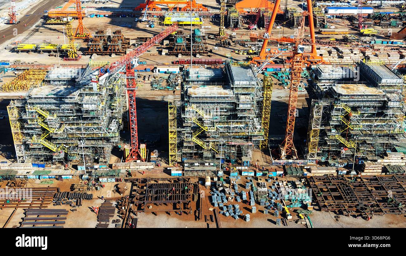 Aerial view of offshore platforms under construction in a shipyard in ...