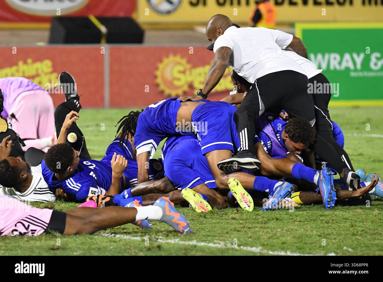 Curacao players and trainers celebrate qualifying for the 2026 FIFA ...