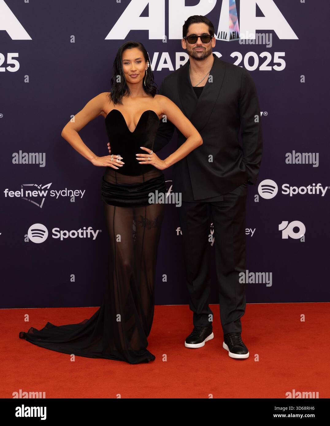 Evelyn Ellis and Duncan James pose for a photo during the 2025 ARIA ...