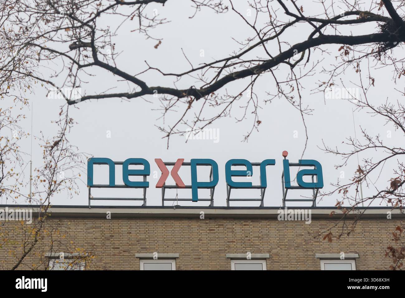 19 November 2025, Hamburg: View of a company building with the Nexperia ...