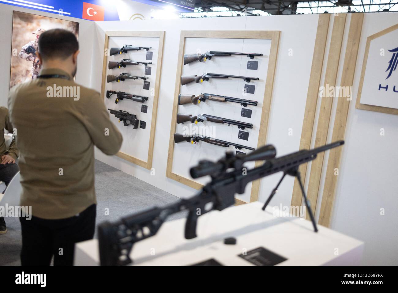 Weapons and rifles are set on a booth during the 24th edition of the ...