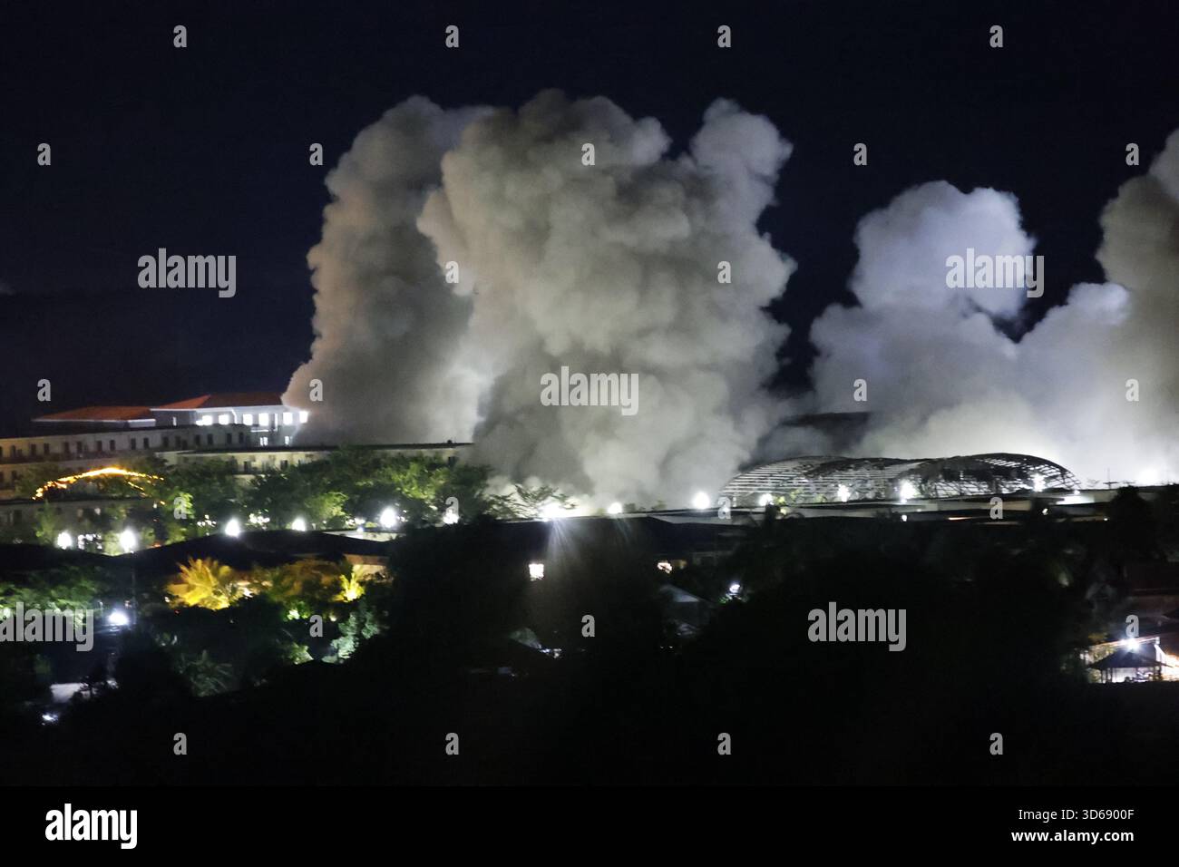 FILE - White smoke billows after an explosion at KK Park online scam ...