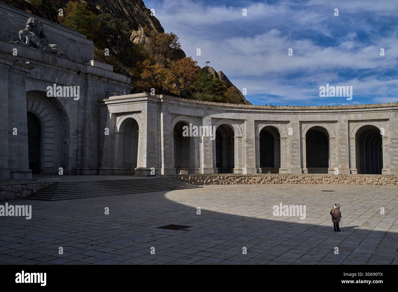 A woman walks at the plaza of the Valle de Cuelgamuros mausoleum ...