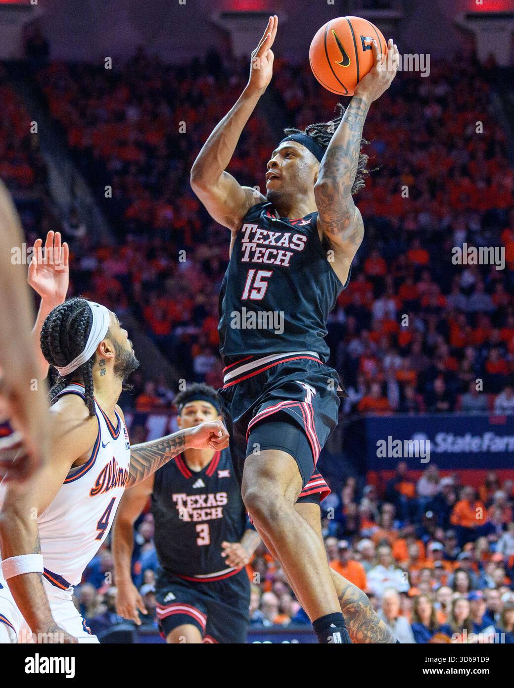 Texas Tech's JT Toppin drives to the basket past Illinois' Kylan ...