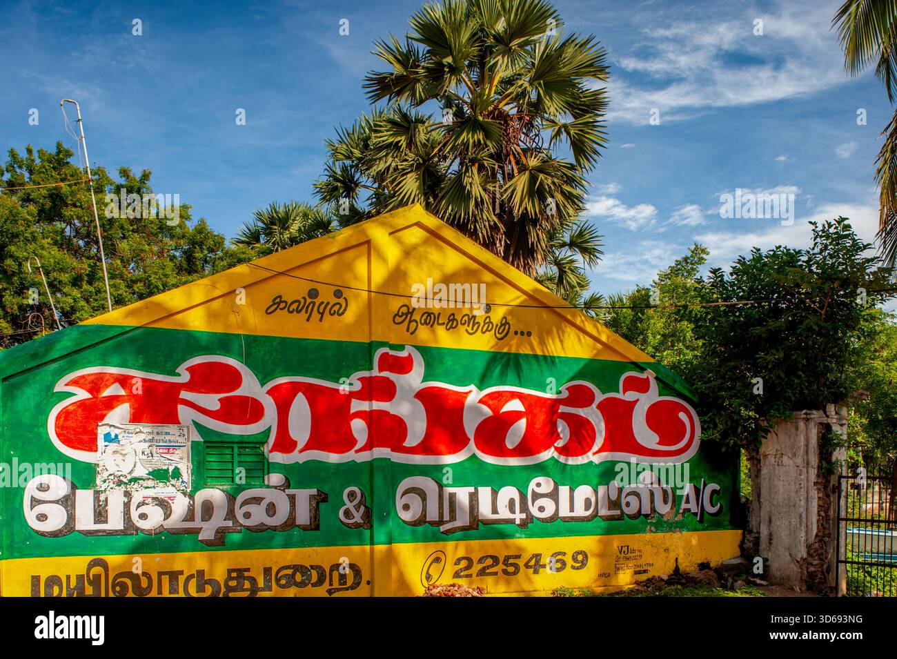 08 21 2009 a wall painting advertising a clothing store in Tamil. in ...