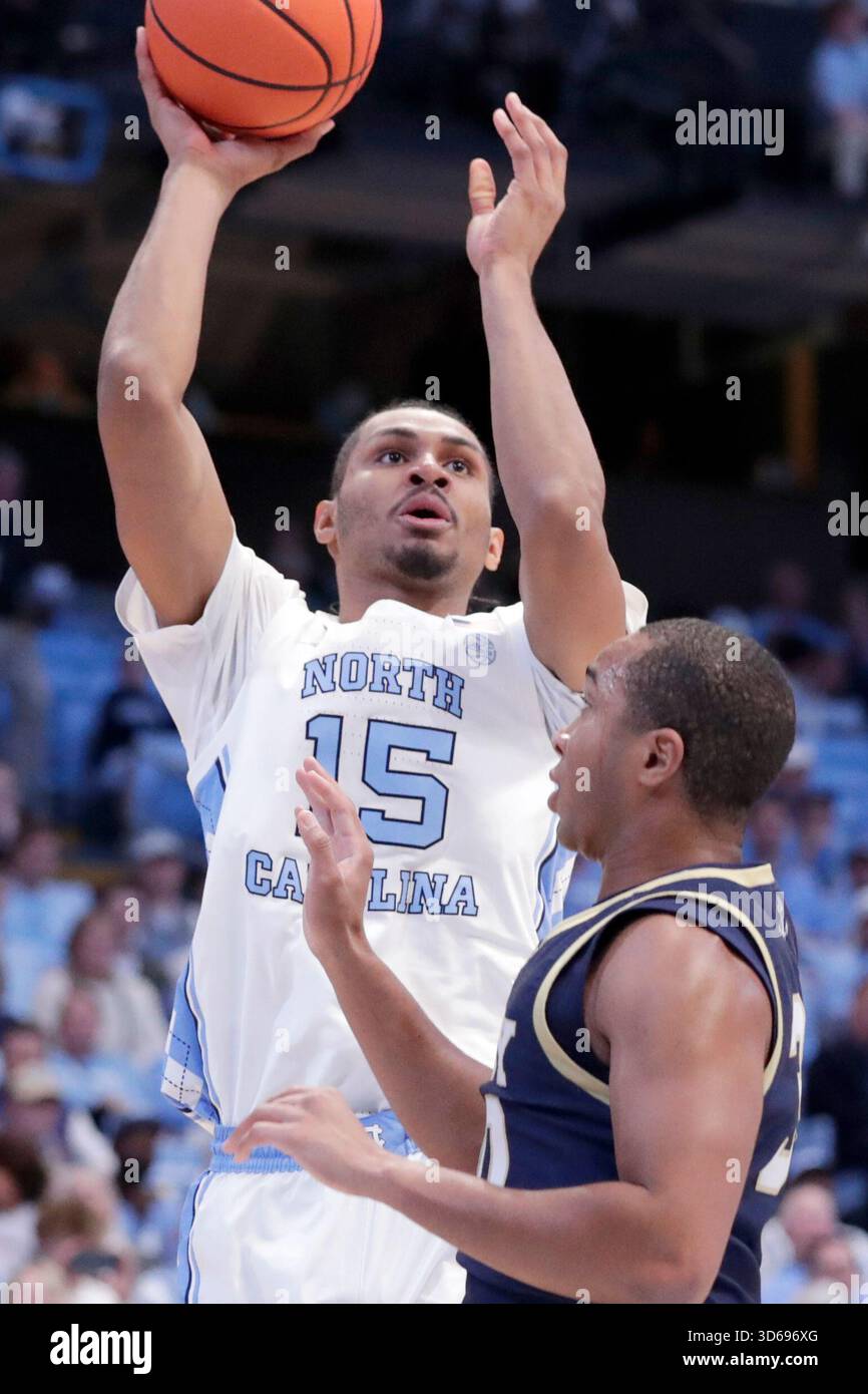 North Carolina forward Jarin Stevenson (15) shoots against Navy forward ...