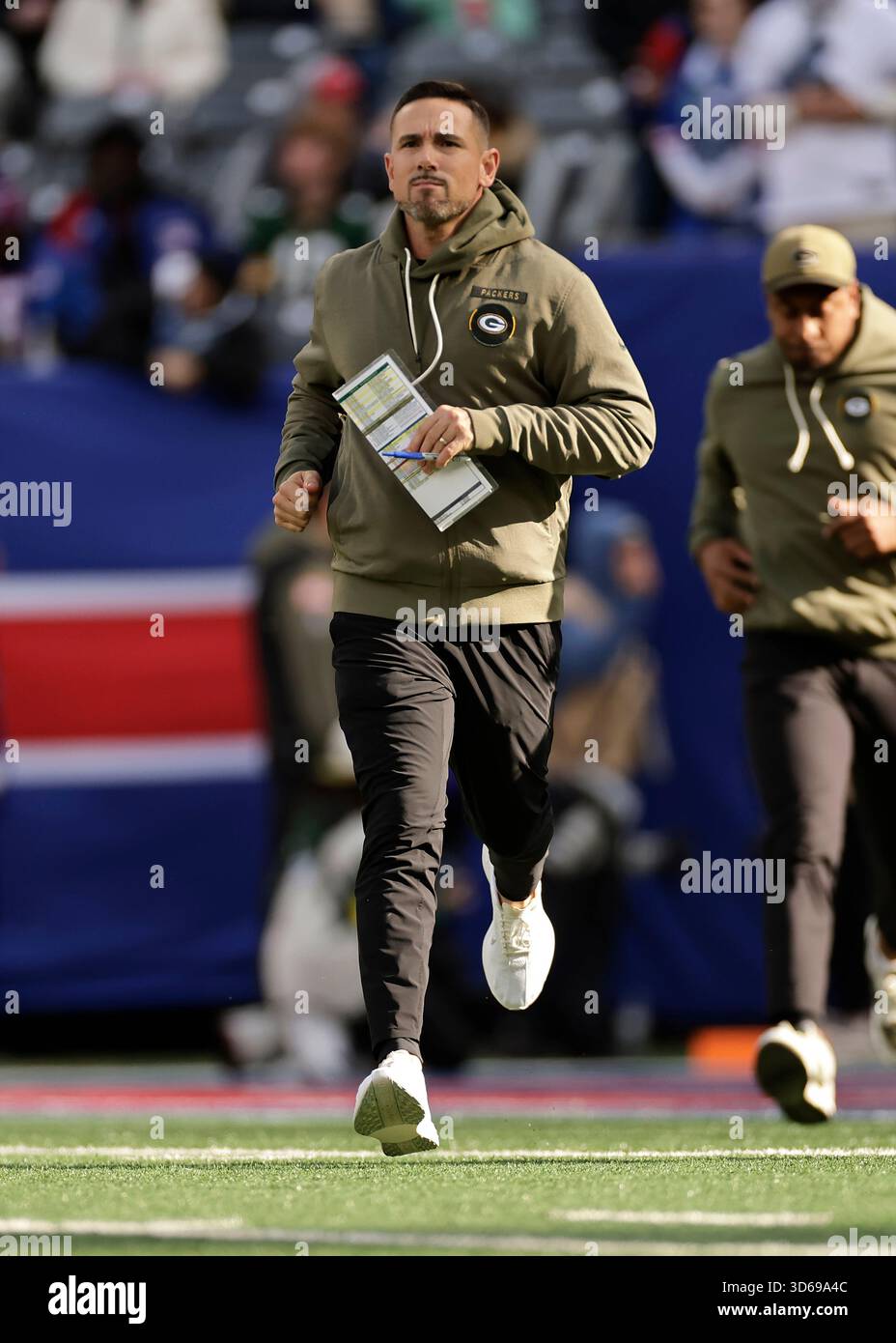 Green Bay Packers head coach Matt LaFleur takes the field for an NFL ...