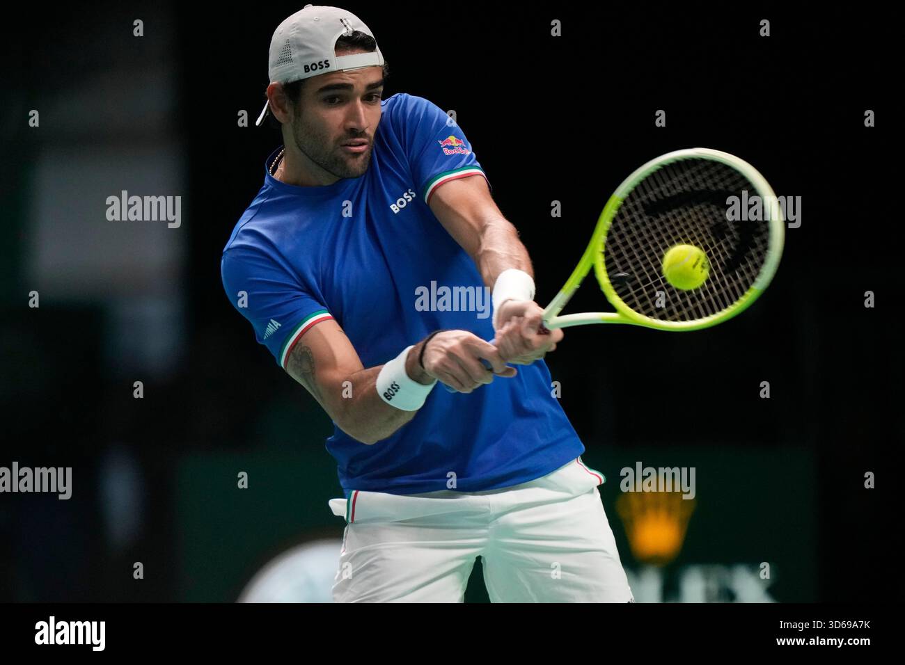Italy's Matteo Berrettini returns the ball to Austria's Jurij Rodionov ...