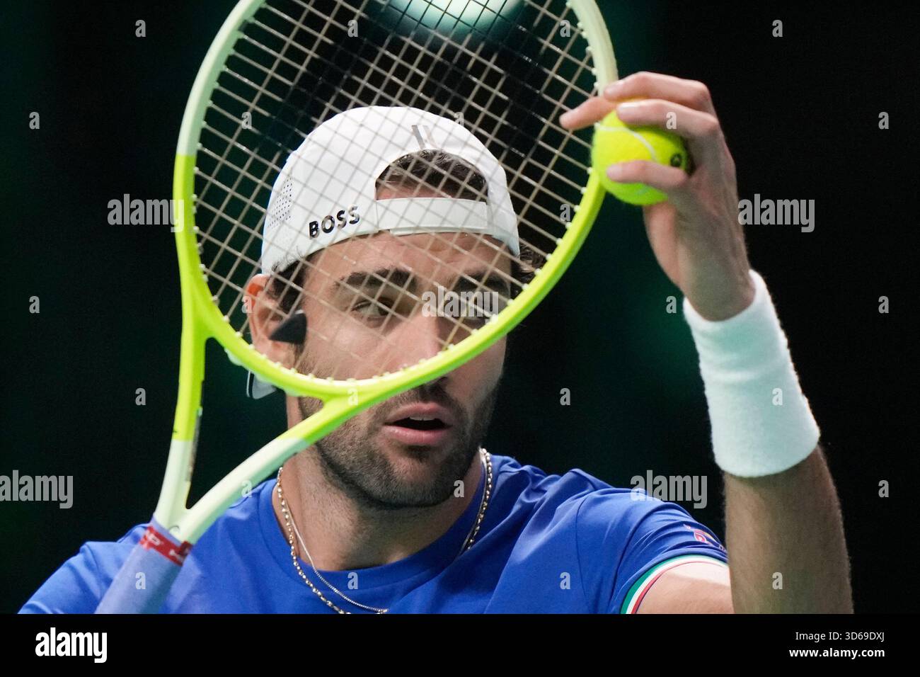 Italy's Matteo Berrettini prepares to serve against Austria's Jurij ...