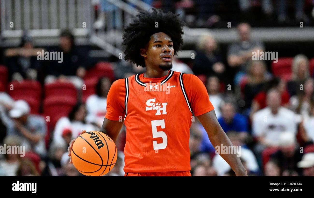 Sam Houston State guard Justin Begg (5) brings the ball up court ...