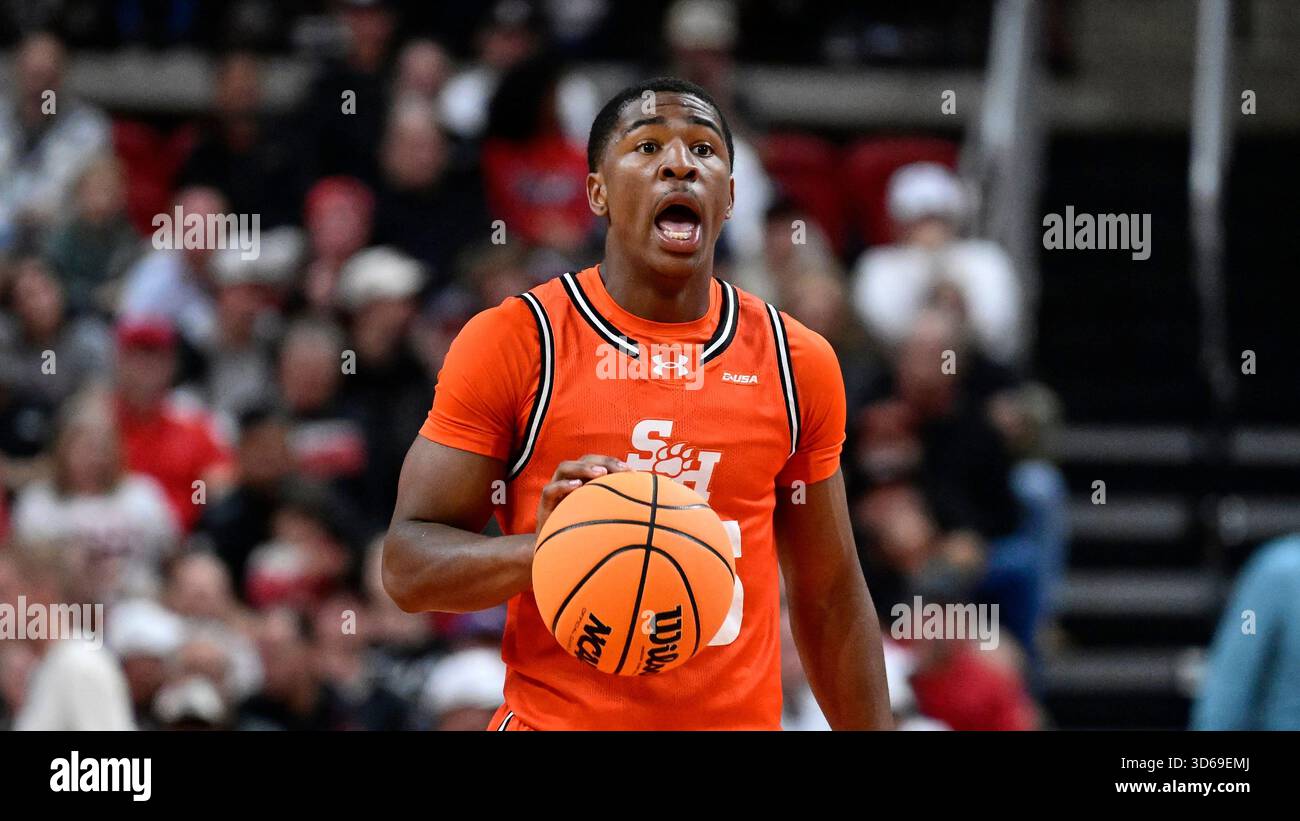 Sam Houston State guard Jacob Walker (55) brings the ball up court ...