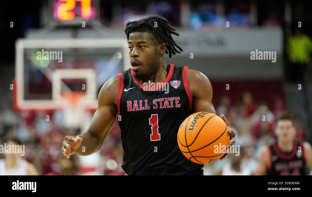Ball State guard Elmore James dribbles the ball during the first half ...
