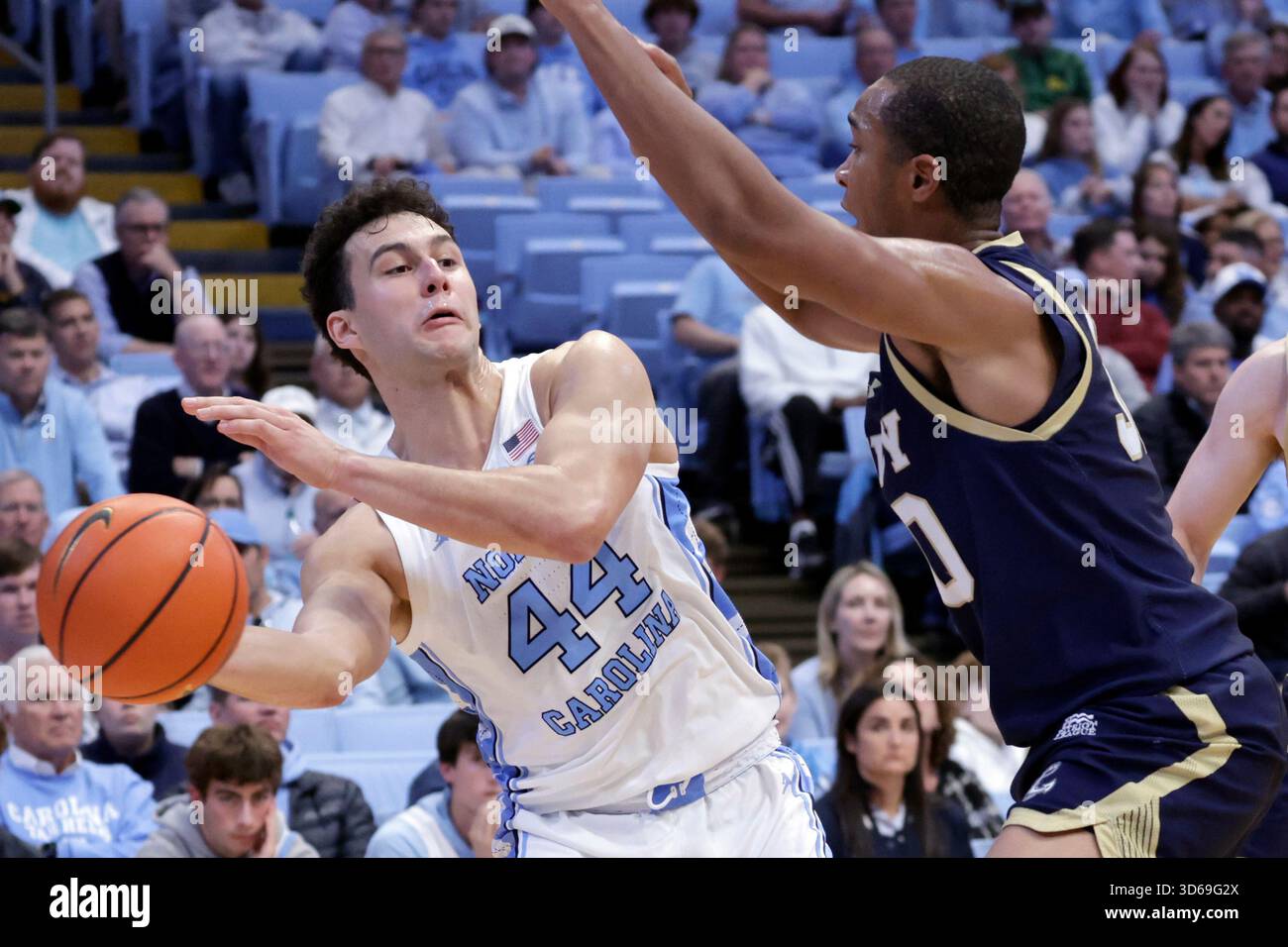North Carolina guard Luka Bogavac (44) looks to pass around Navy ...