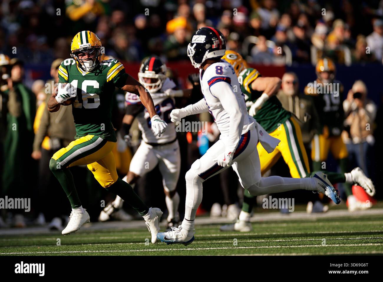 Green Bay Packers cornerback Bo Melton (16) runs with the ball past New ...