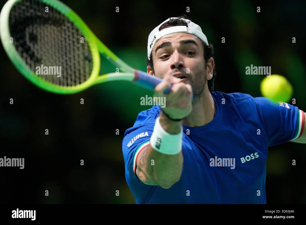 Italy's Matteo Berrettini returns the ball to Austria's Jurij Rodionov ...