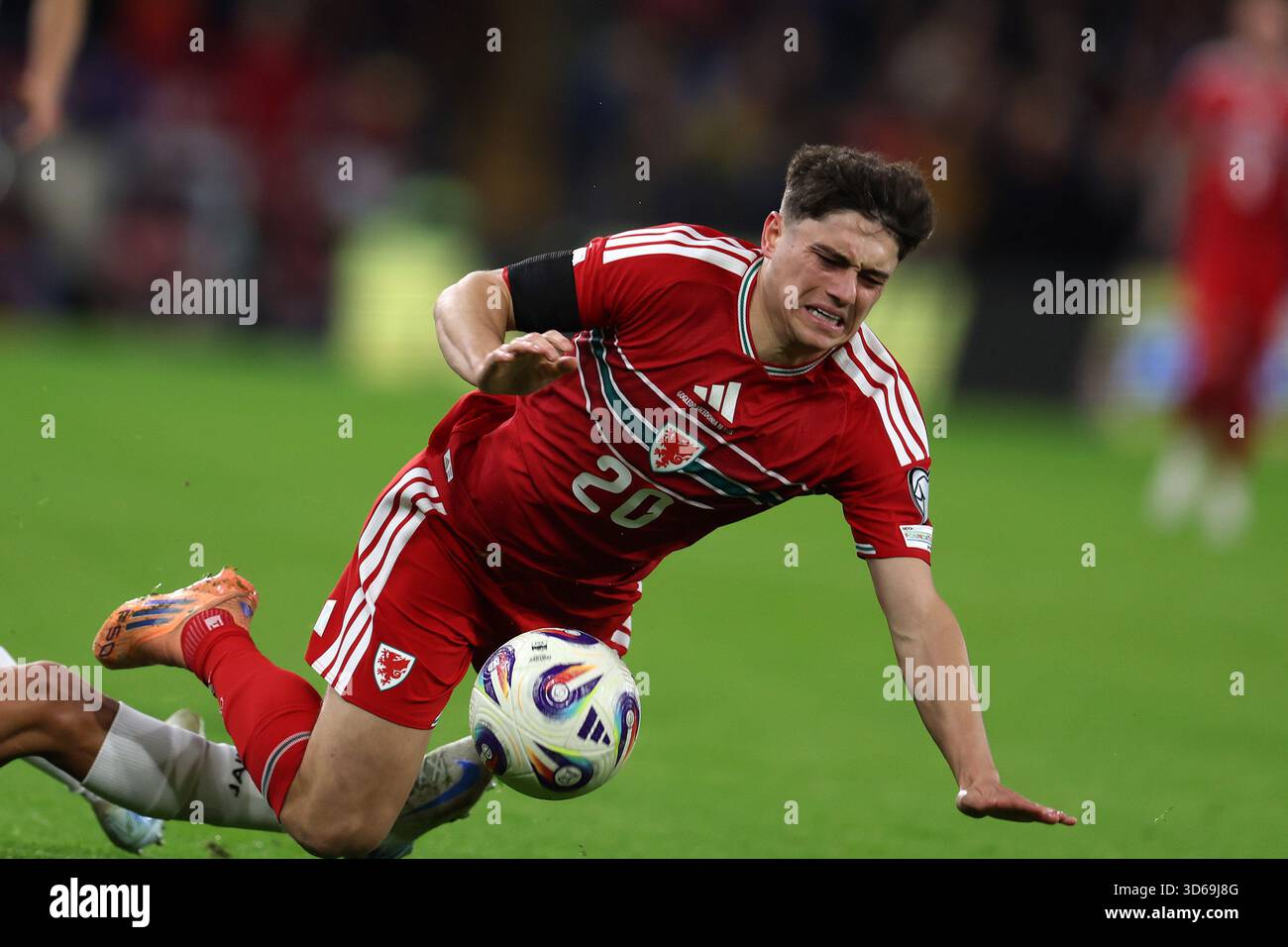 Dan James of Wales (20) is fouled by Tihomir Kostadinov of North ...