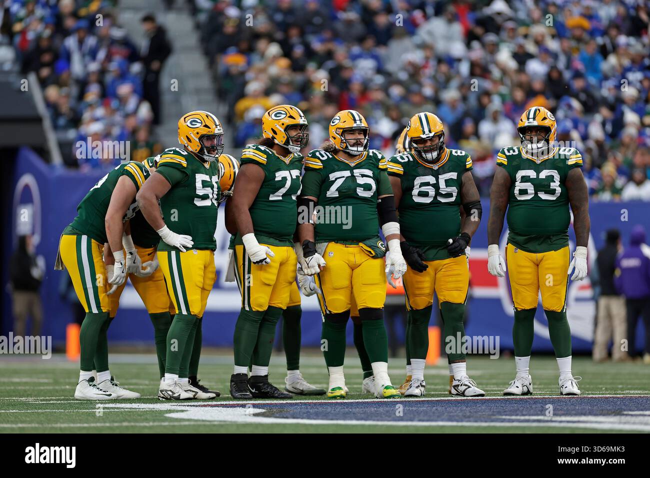 Green Bay Packers guard Sean Rhyan (75) with teammates during an NFL ...