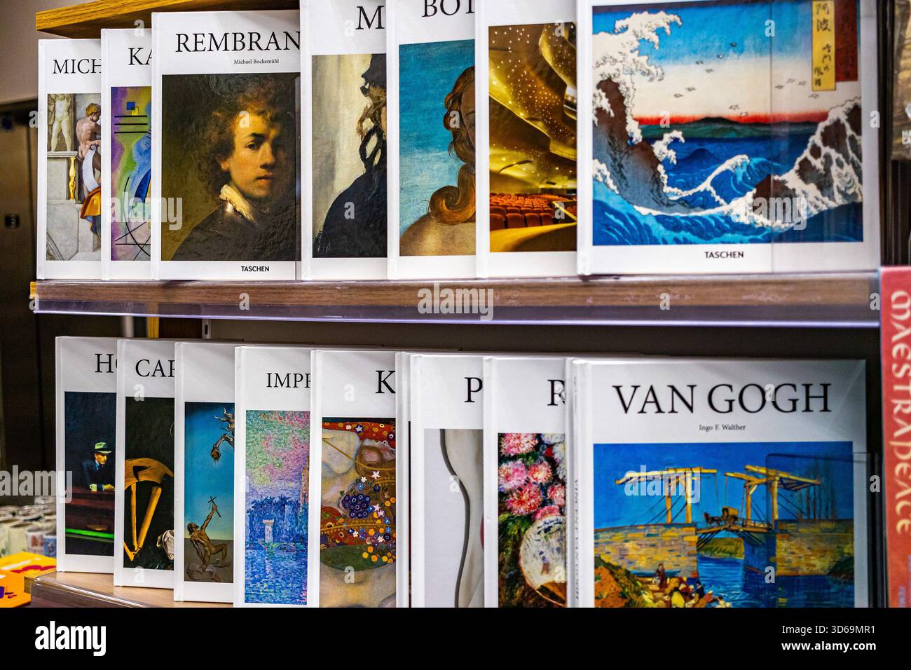 Bookshelf of art and artist books, bookstore with a shelf of books ...