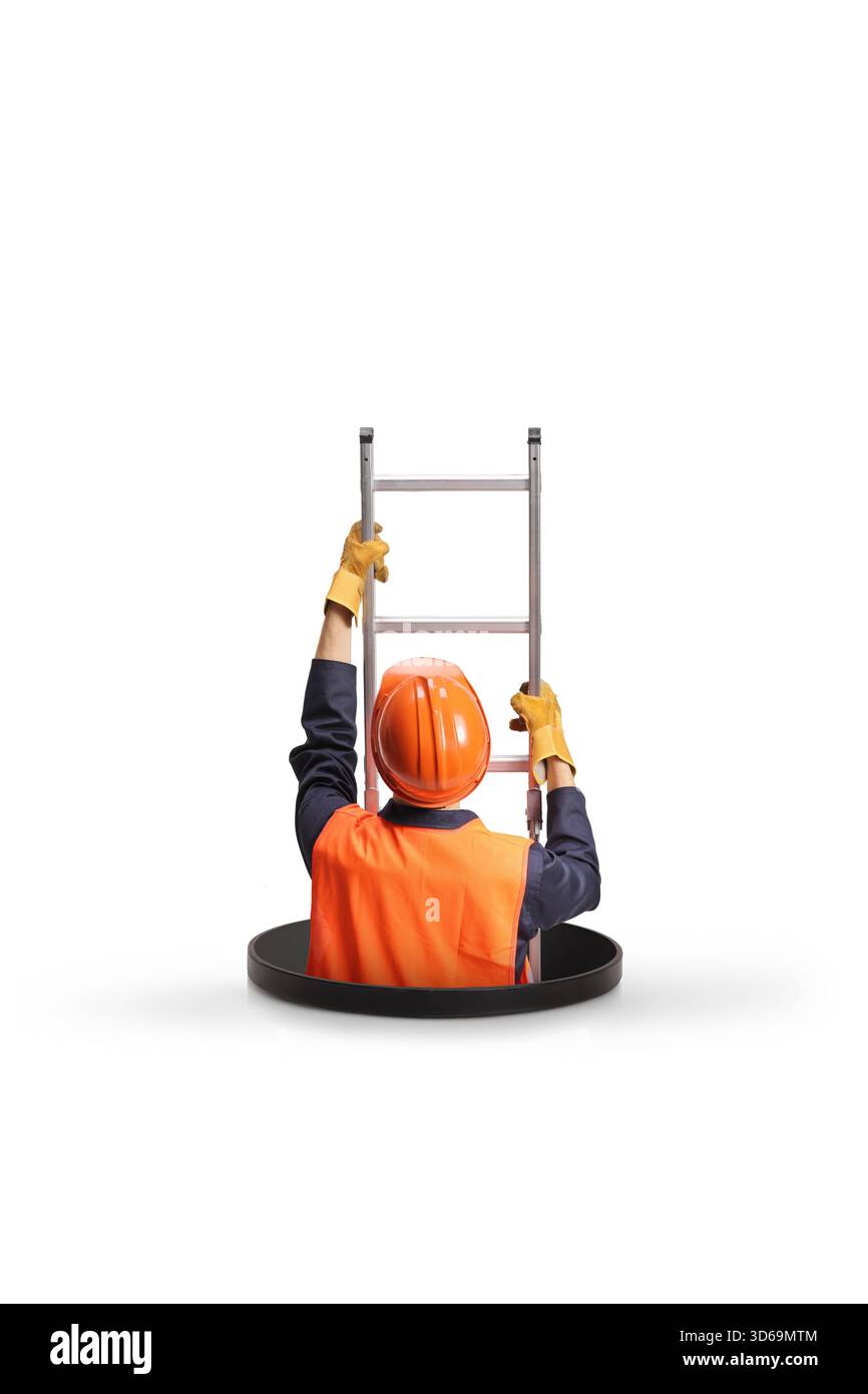 Worker climbing a ladder in a manhole shaft isolated on white ...