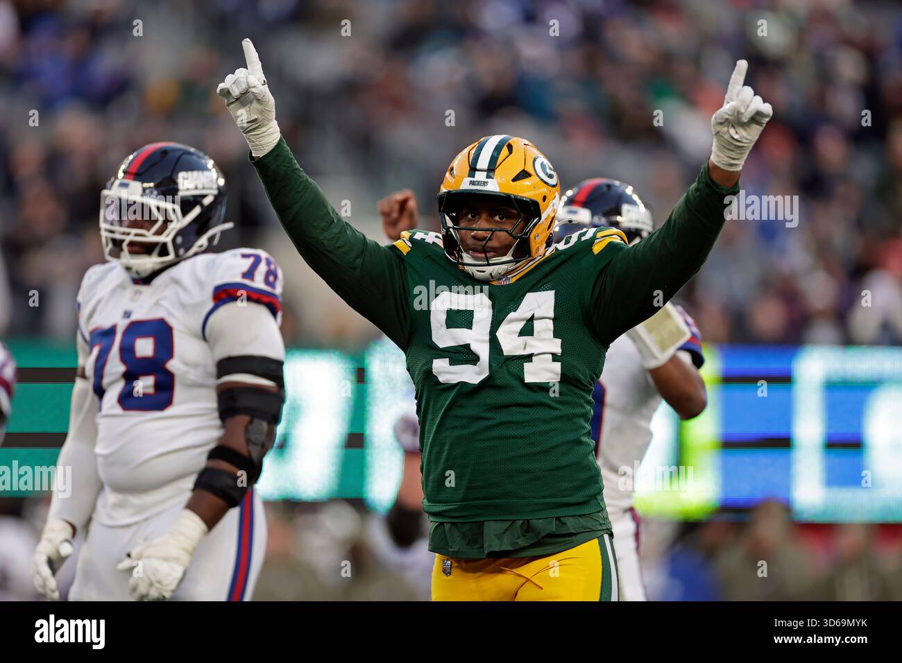 Green Bay Packers defensive end Karl Brooks (94) reacts to an ...