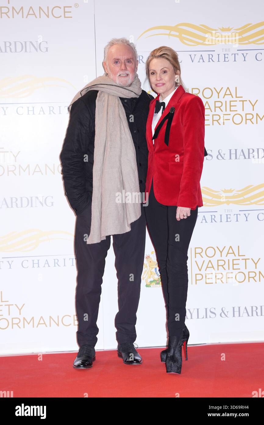 Queen drummer Roger Taylor and his wife Sarina Potgieter, attend the ...