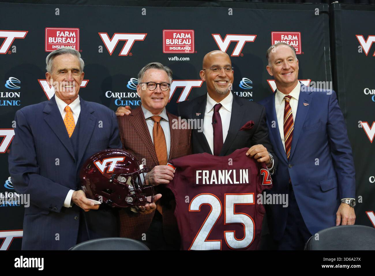 James Franklin poses for a photo with John G. Rocovich, Timothy Sands ...
