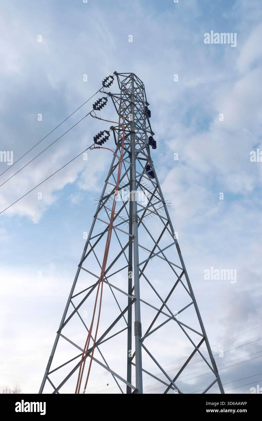Tall steel electricity pylon with high-voltage power lines Stock Photo ...