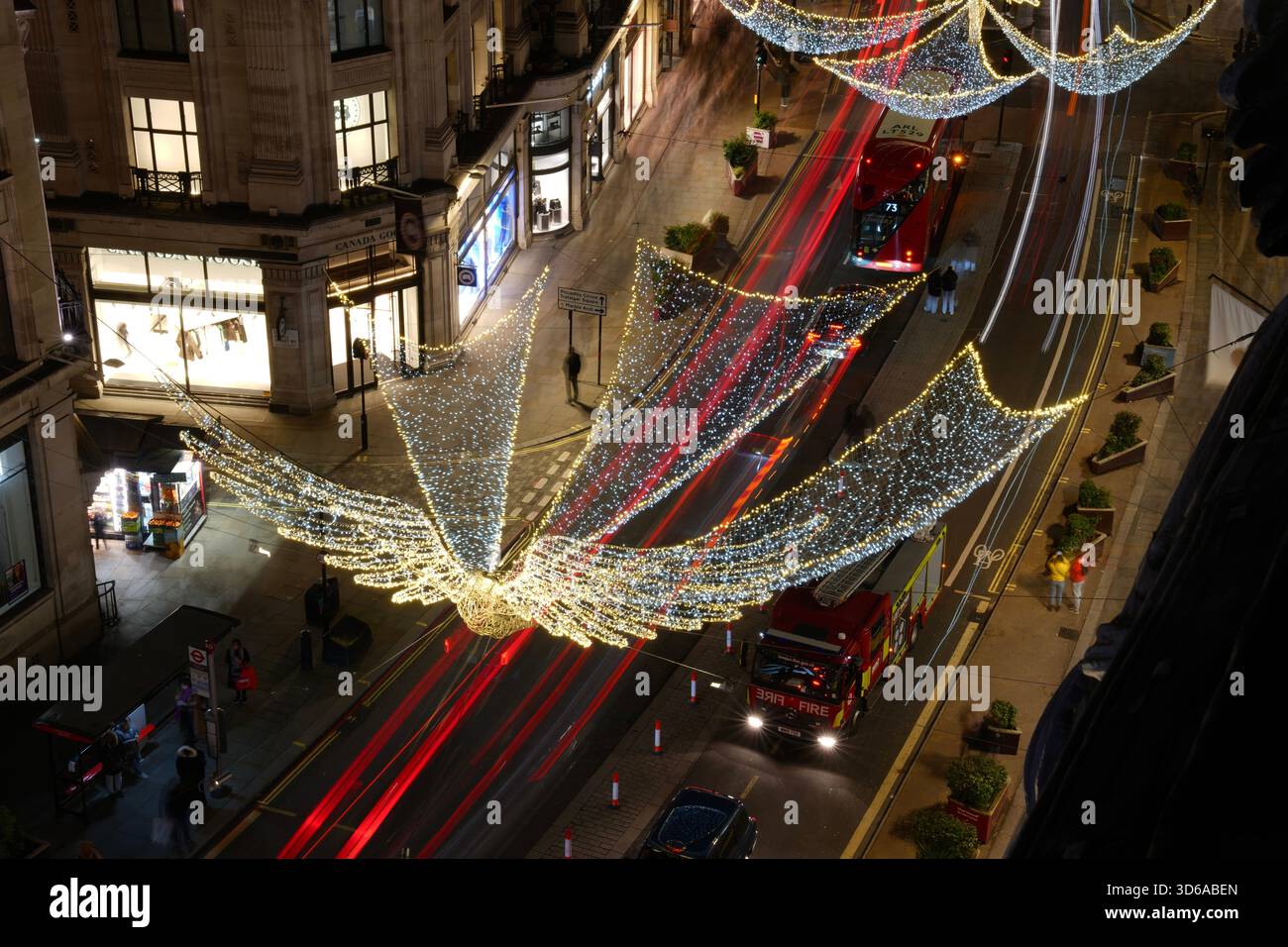 Christmas lights are displayed on Regent Street, in London, Wednesday ...