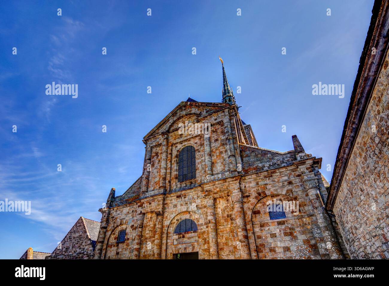 Stone ramparts and towering buttresses of the abbey at Mont-Saint ...