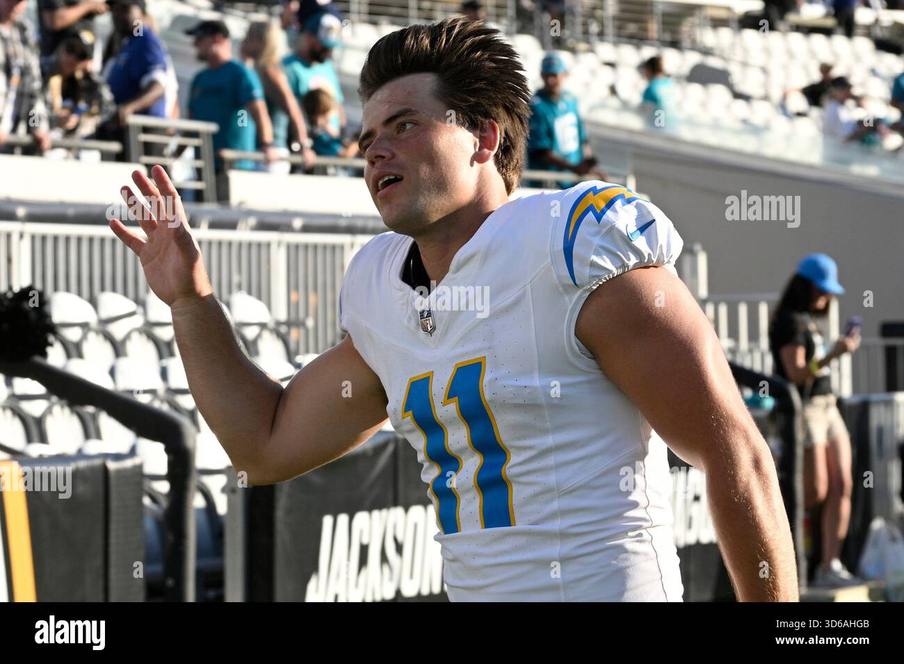 Los Angeles Chargers place kicker Cameron Dicker (11) leaves the field ...