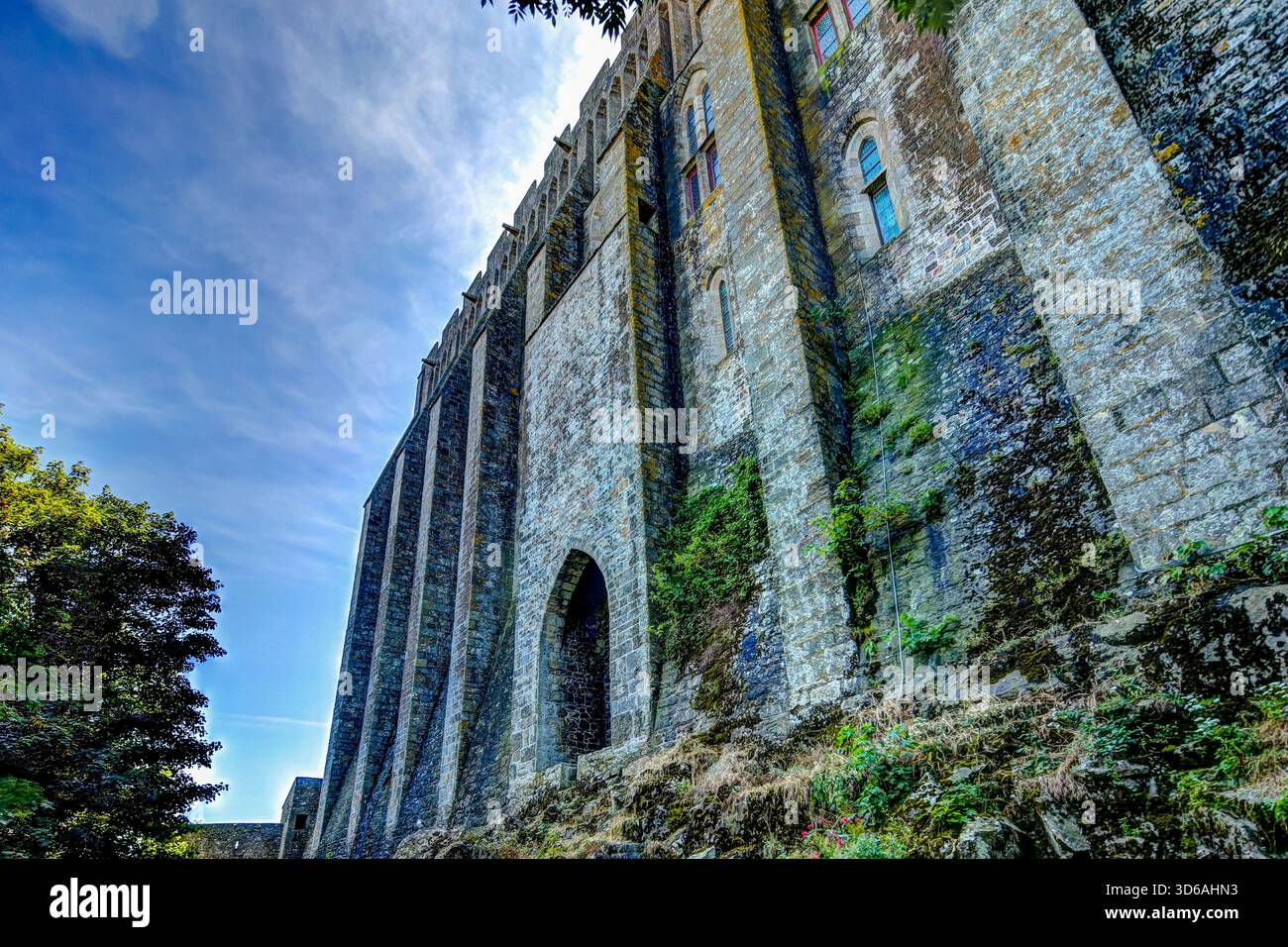 Stone ramparts and towering buttresses of the abbey at Mont-Saint ...