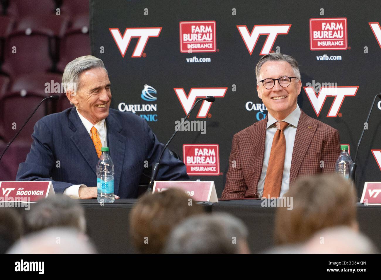John Rocovich, left, a member of Virginia Tech Board of Visitors, and Virginia Tech President ...