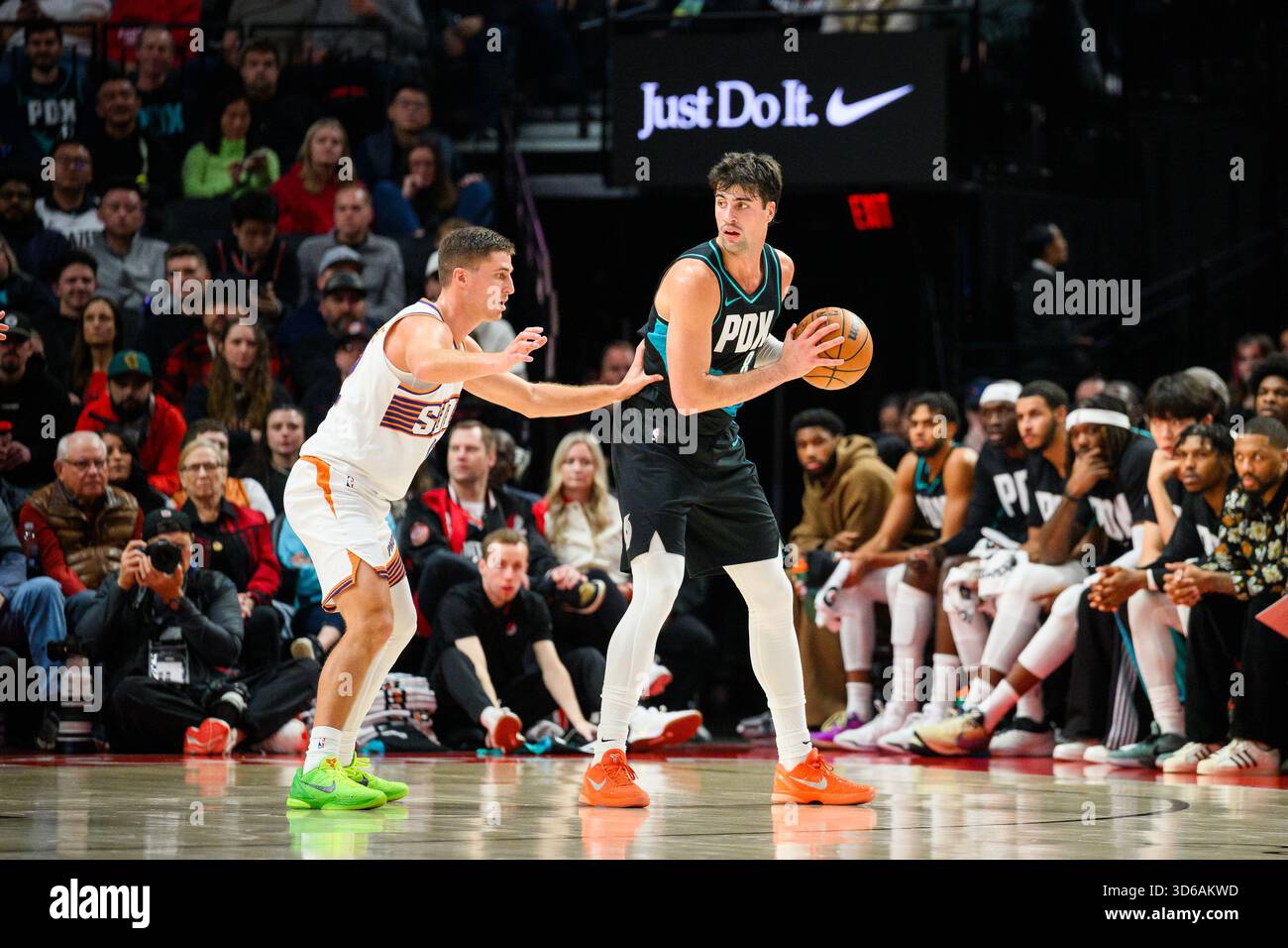Portland Trail Blazers forward Deni Avdija (8) and Phoenix Suns guard ...