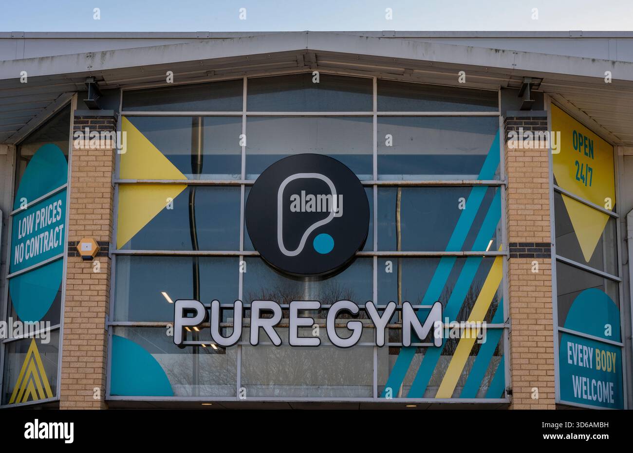 front of Pure Gym premises with banner logo above doorway. Puregym ...