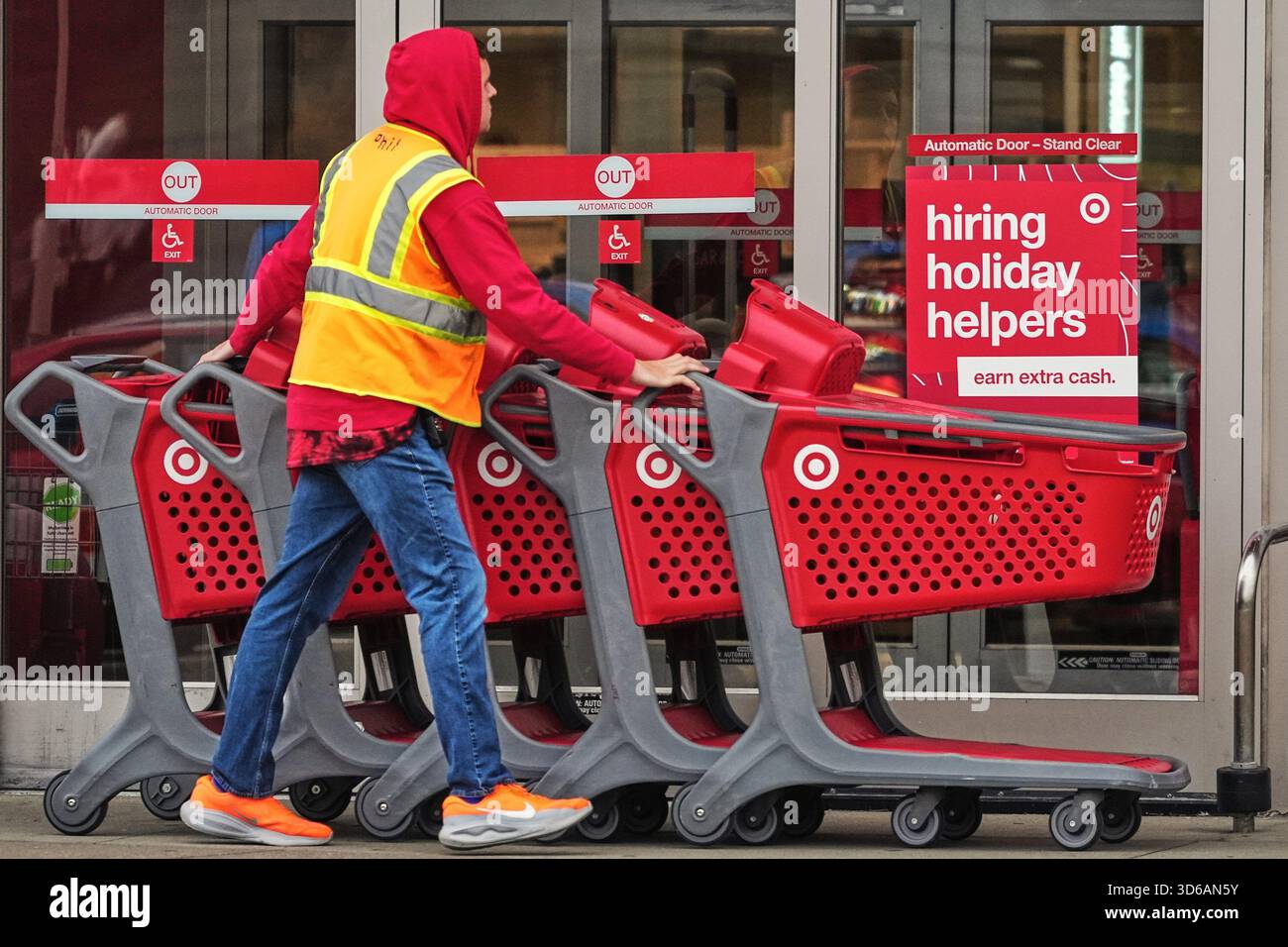 Signs for holiday hiring hang on the doors of a Target in Pittsburgh ...