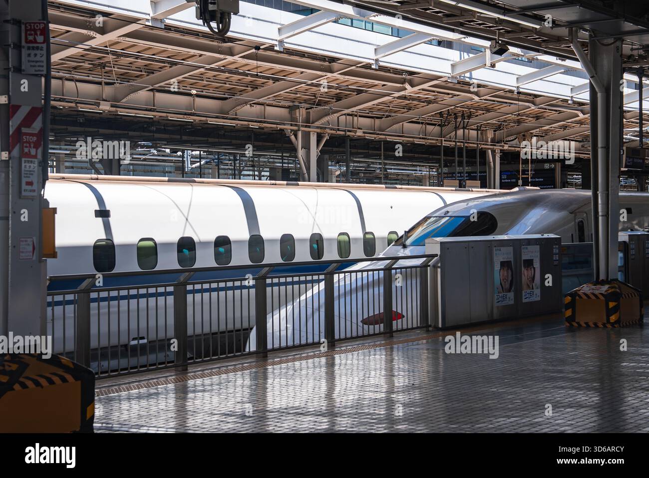 Shinkansen stopped at open air platform in Osaka rail station Stock ...