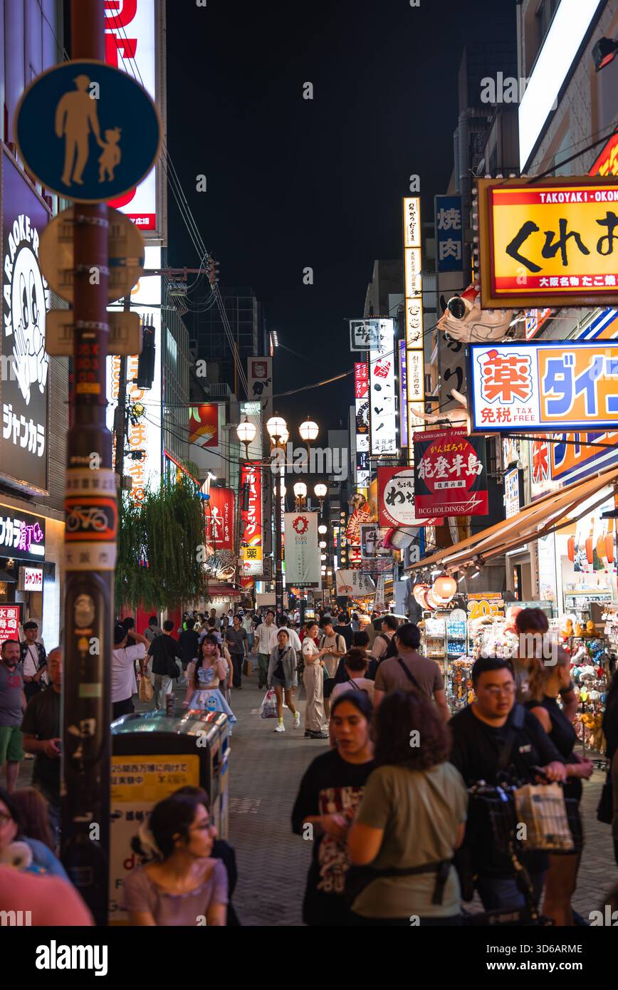 Night crowds and neon signage in Dotonbori, Osaka, Japan Stock Photo ...