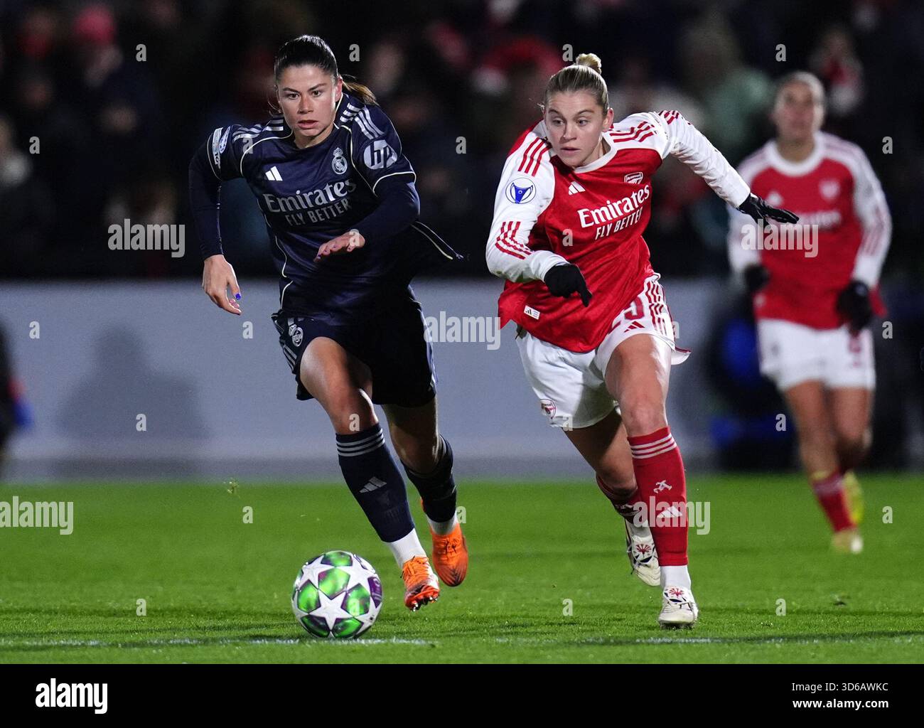 Real Madrid's Maria Mendez (left) and Arsenal's Alessia Russo in action ...