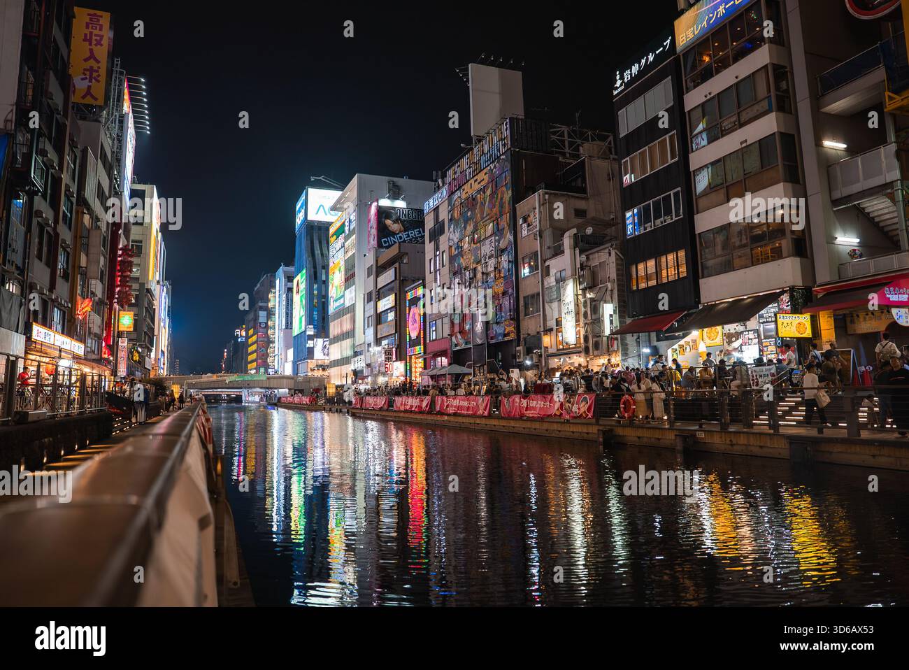 Dotonbori canal at night in Osaka, neon signs reflect on water Stock ...
