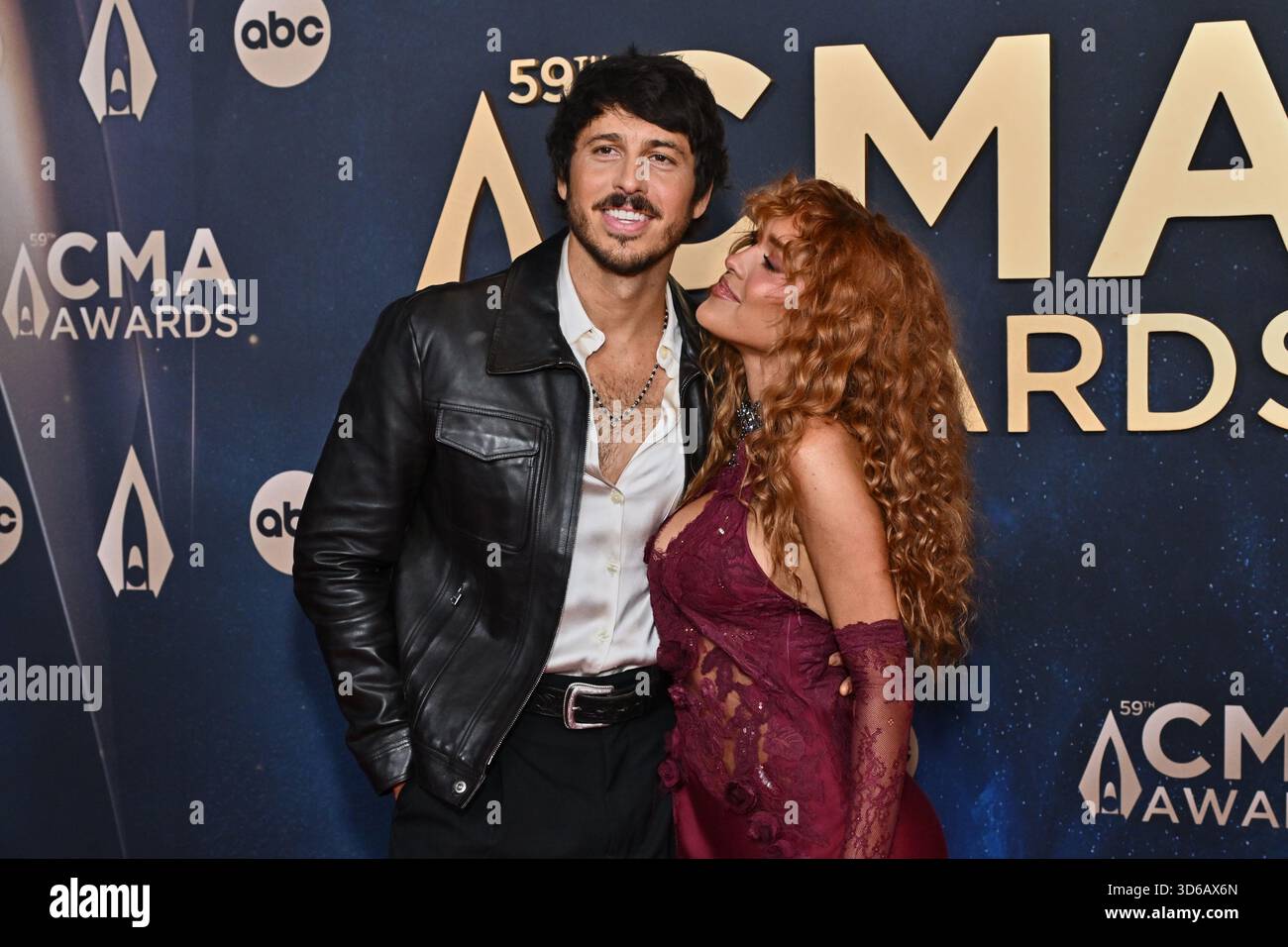 Morgan Evans, left, and Laci Kaye Booth arrive at the 59th Annual ...