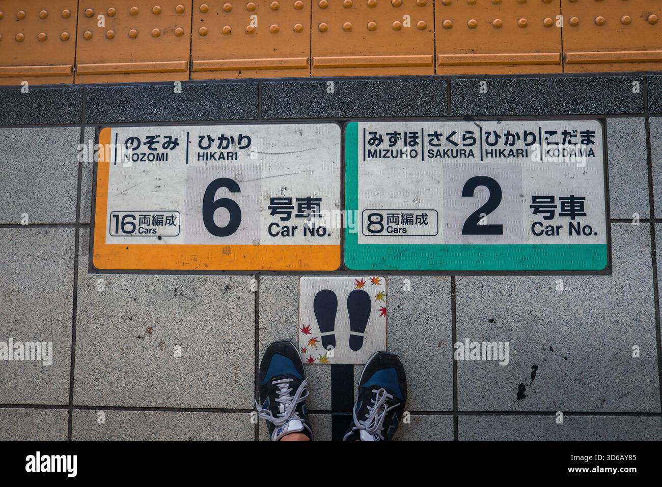 Japanese Shinkansen platform markers for car numbers and queue lines ...