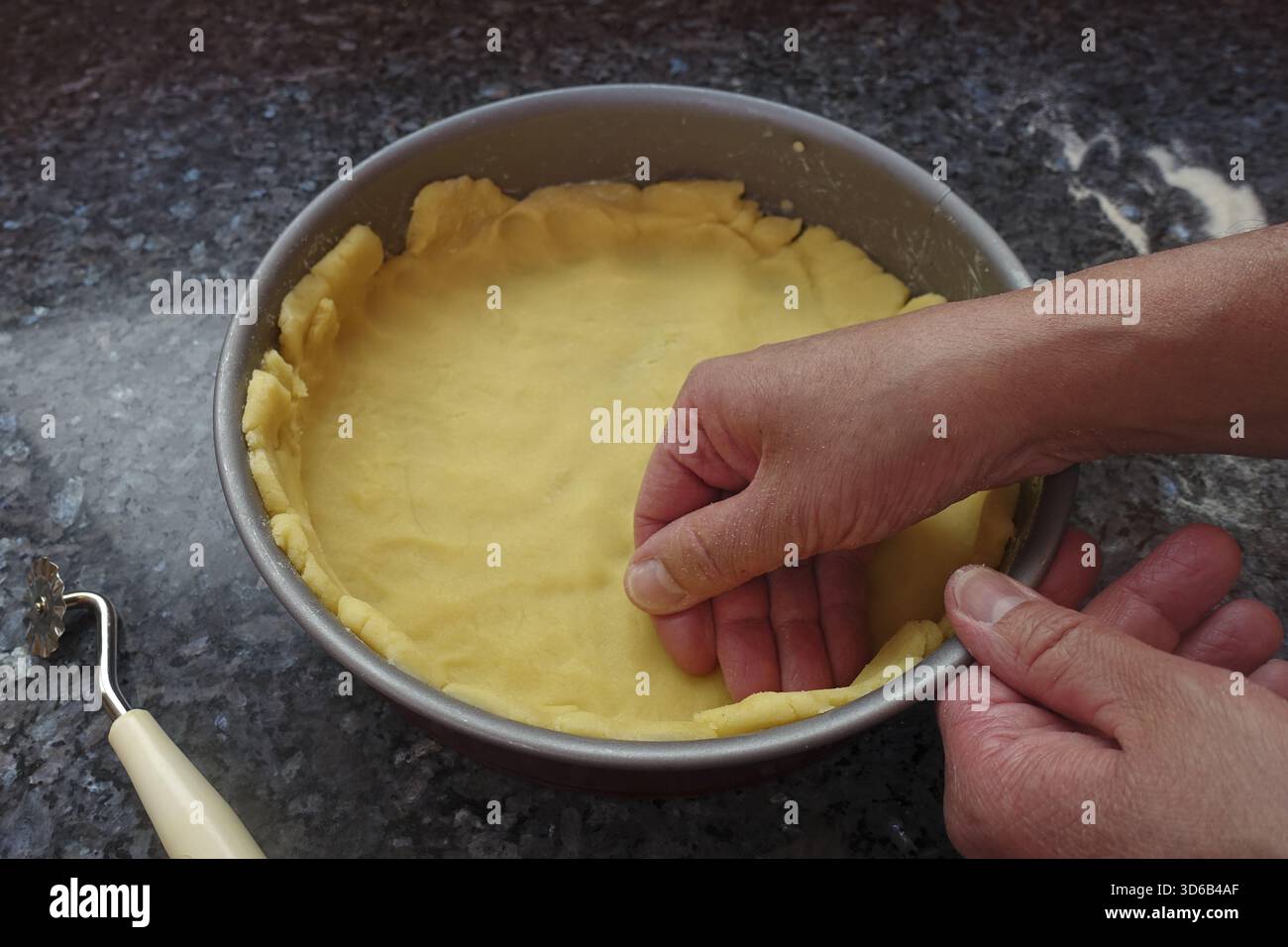 Southern German cuisine, preparation shortcrust pastry, put raw dough ...
