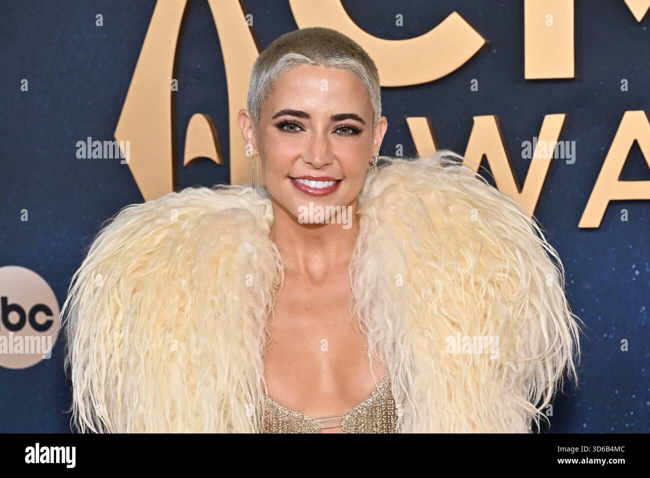 CeCe arrives at the 59th Annual Country Music Association Awards on ...