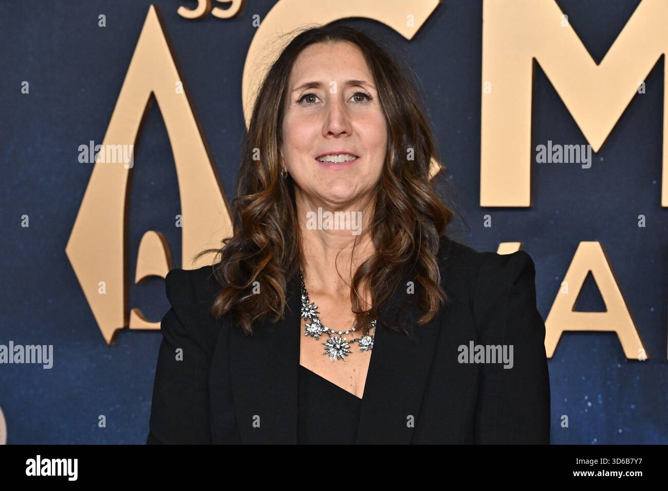 Lynette Garbonola arrives at the 59th Annual Country Music Association ...