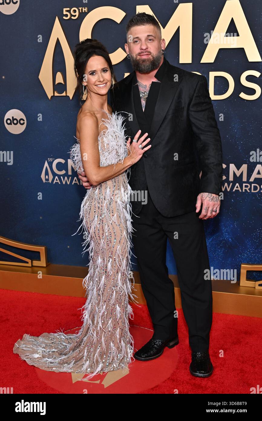 Amber Cochran Gilbert, left, and Brantley Gilbert arrive at the 59th ...