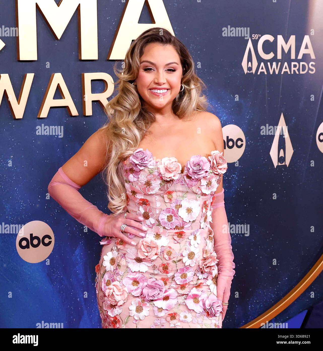 Alexandra Kay arrives on the red carpet for the 59th CMA Awards in ...