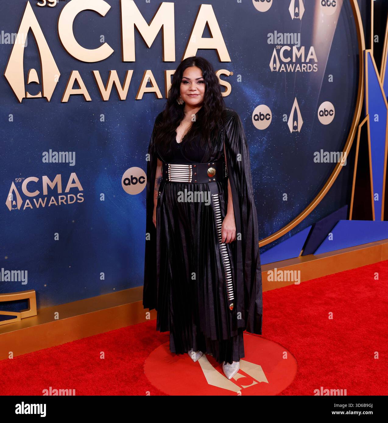 Jade Turner arrives on the red carpet for the 59th CMA Awards in ...