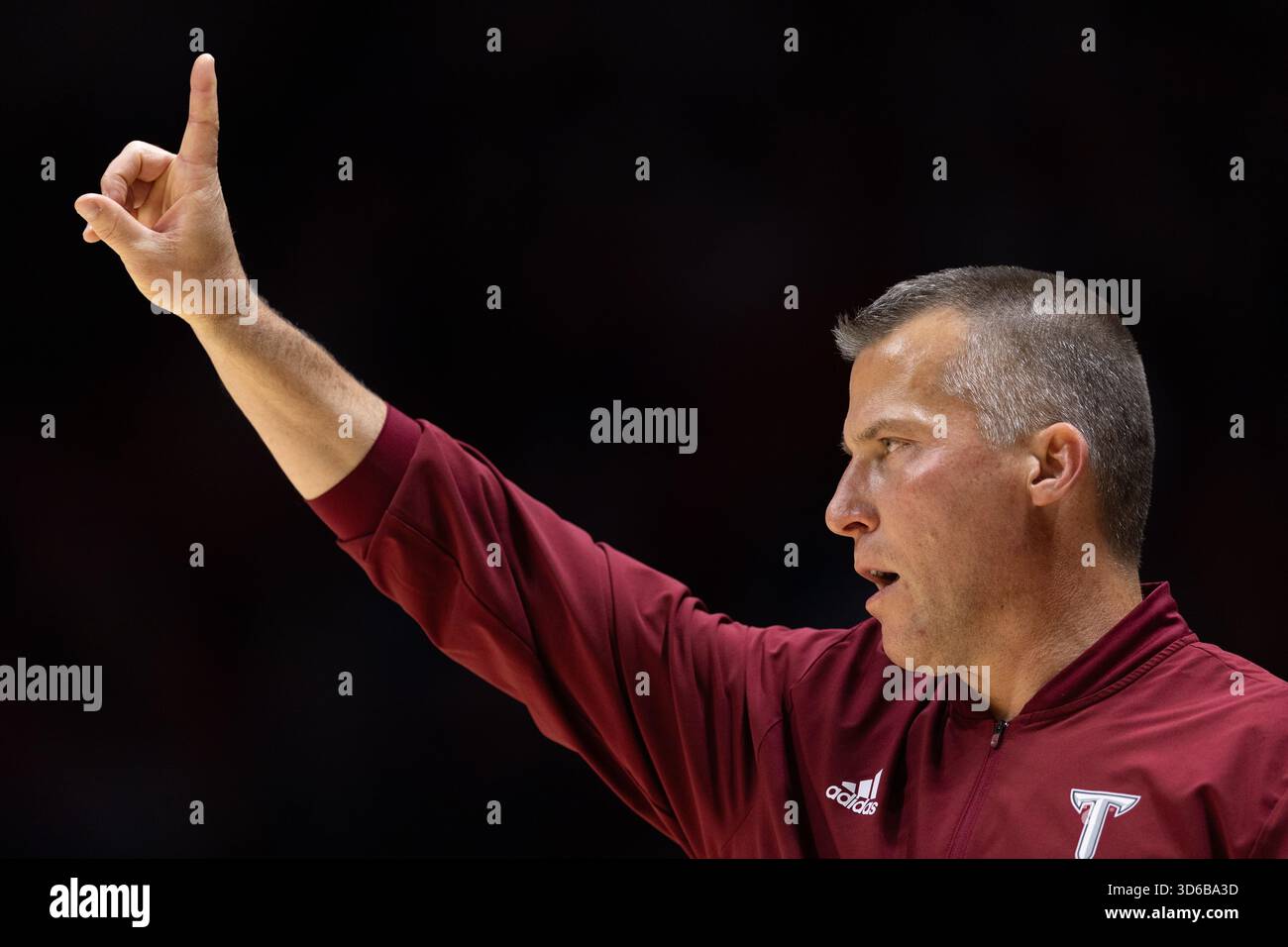 SAN DIEGO, CA - NOVEMBER 18: Troy head coach Scott Cross signals during ...