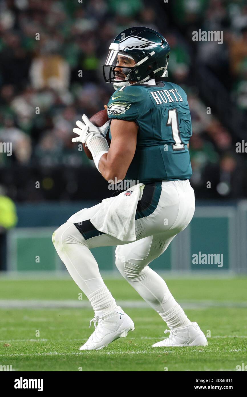 Philadelphia Eagles quarterback Jalen Hurts (1) drops back to throw a ...