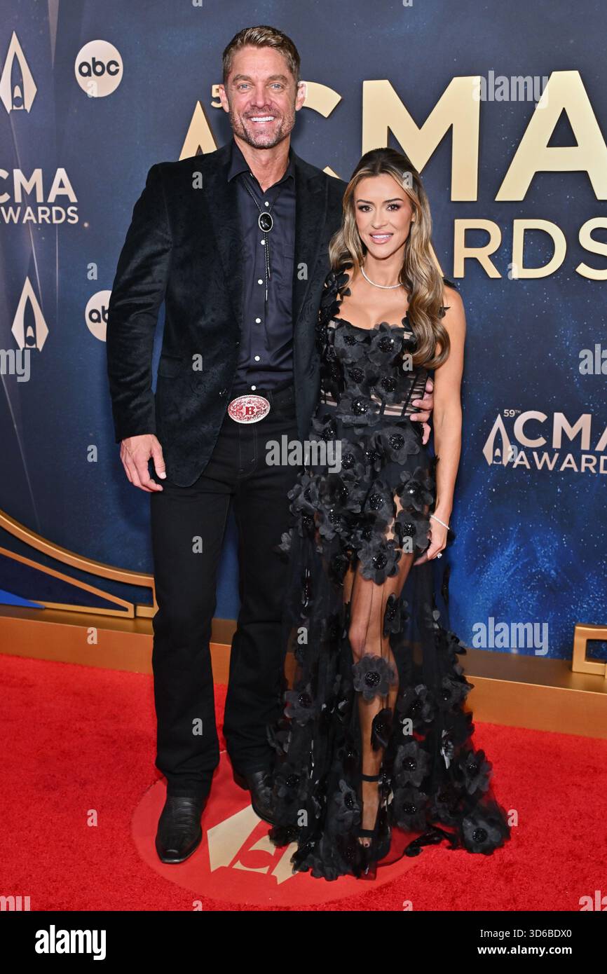 Brett Young, left, and Taylor Mills arrive at the 59th Annual Country ...